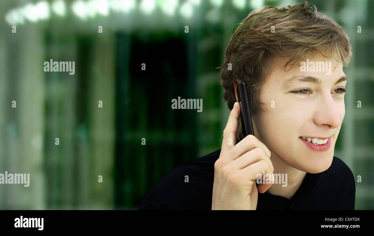 Young businessman, speaking on a mobile phone Stock Photo - Alamy