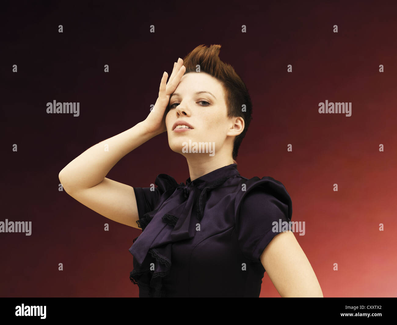 Seriously young woman posing hi-res stock photography and images - Alamy