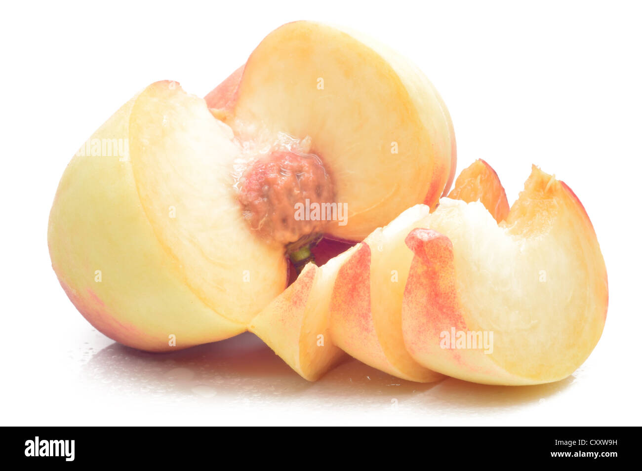 Peach with fig slices on white background Stock Photo - Alamy