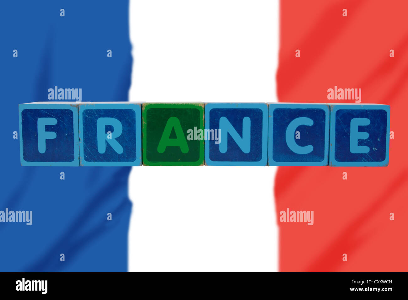 toy letters that spell france against a flag background with clipping ...