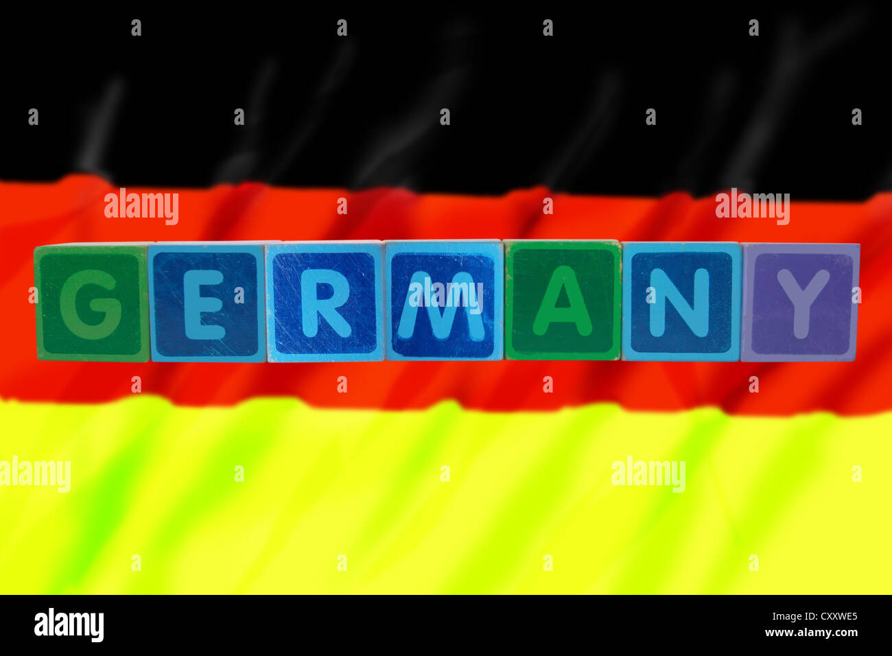 toy letters that spell germany against a flag background with clipping ...