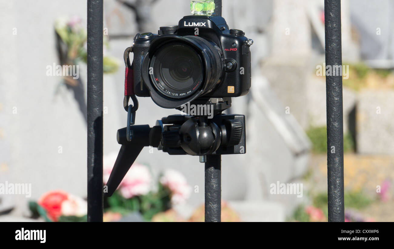 A Manfrotto camera clamp used to hold a Panasonic camera in position ...