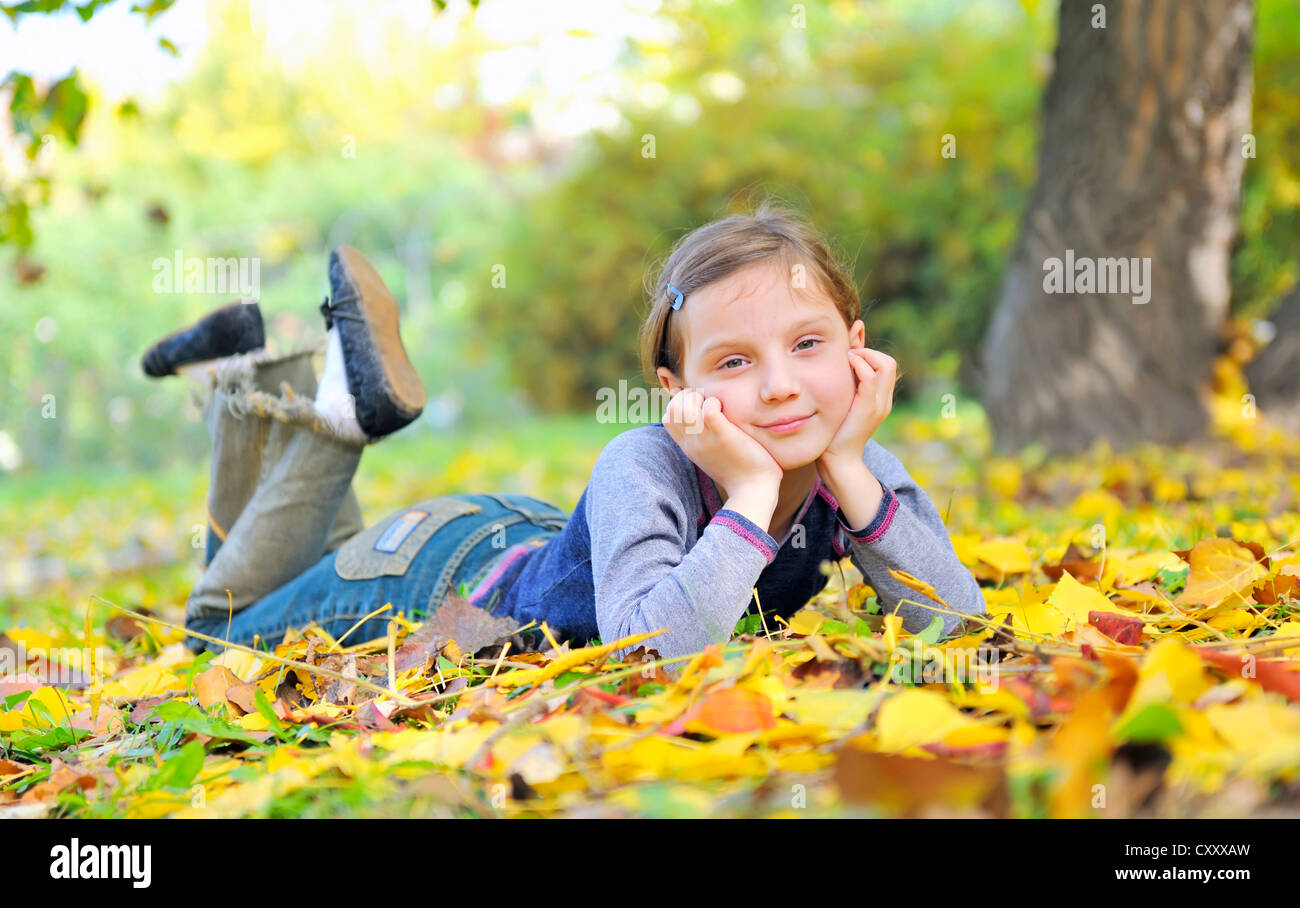 Child laying down playground hi-res stock photography and images - Alamy