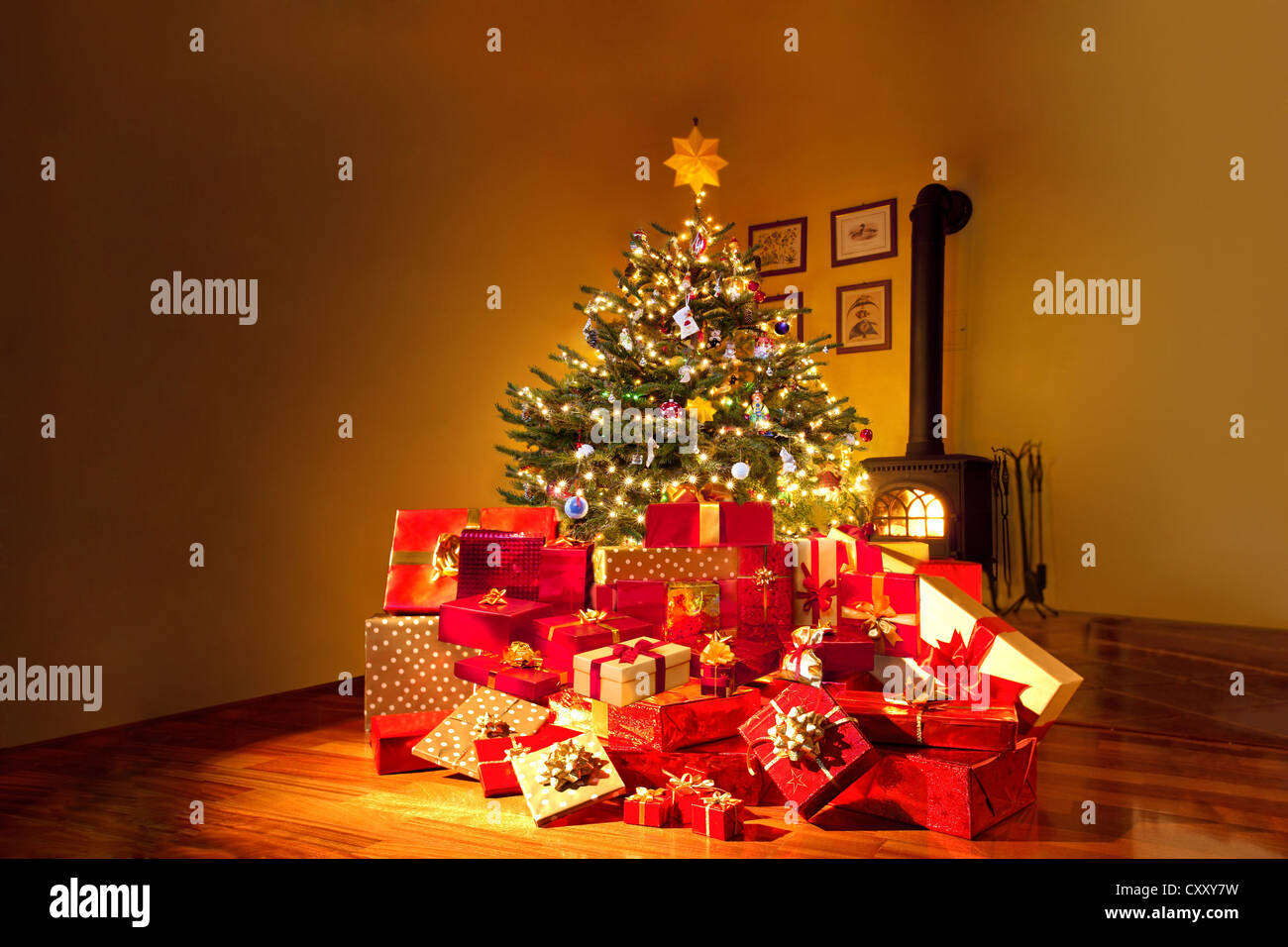 Christmas, little "mountain" of gifts in front of a Christmas tree ...