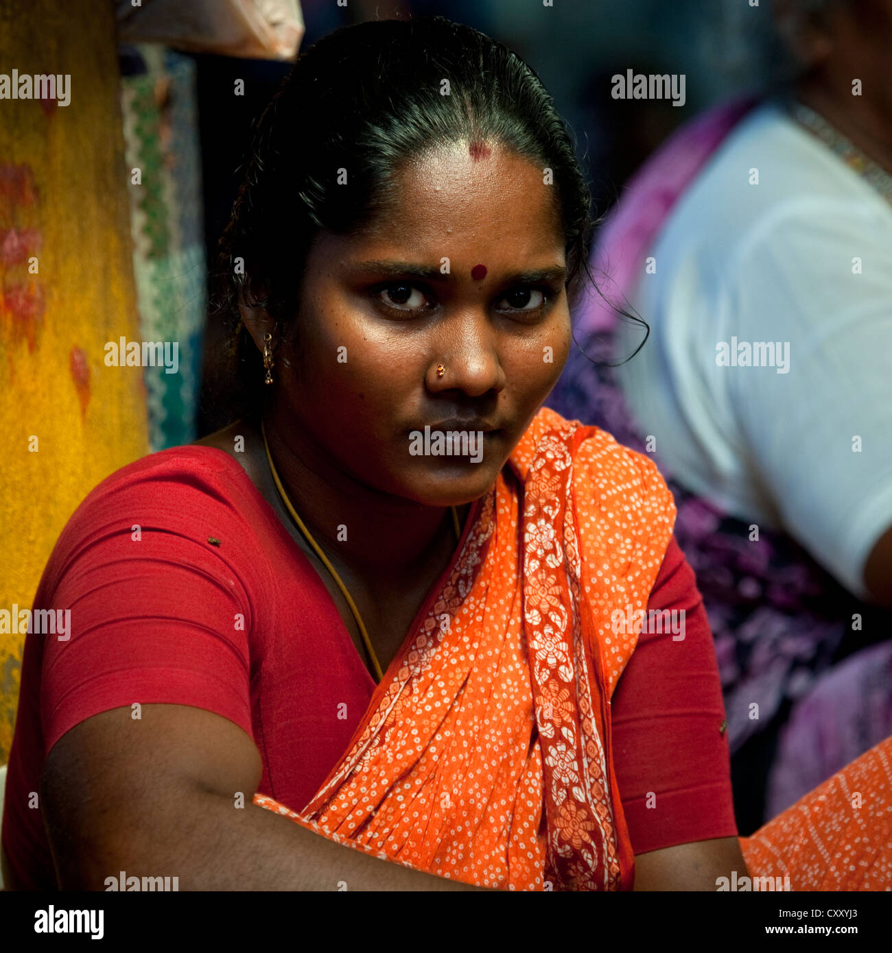 Hindu Woman With Bindi In Sari Sitting On A Temple, Pondicherry, India ...