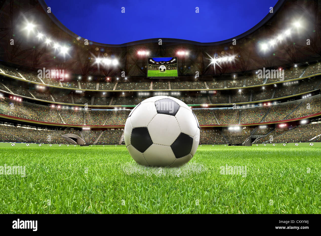 Soccer ball, soccer stadium, lawn, grand stand Stock Photo - Alamy