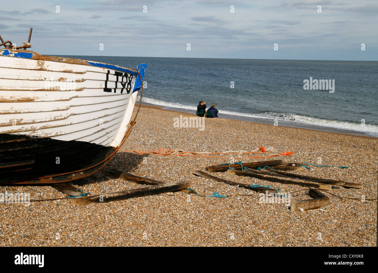 Boat and shingle beach Dunwich Suffolk England UK Stock Photo - Alamy