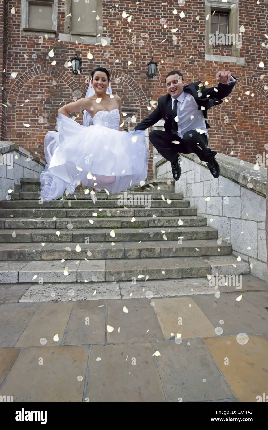 Happy wedding jumping groom hi-res stock photography and images - Alamy