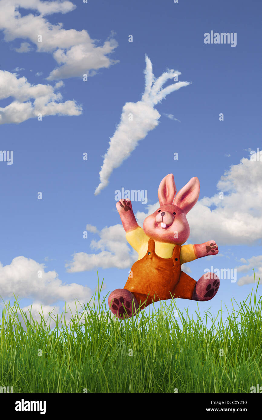 Bunny reaching for a cloud shaped like a carrot, illustration Stock ...