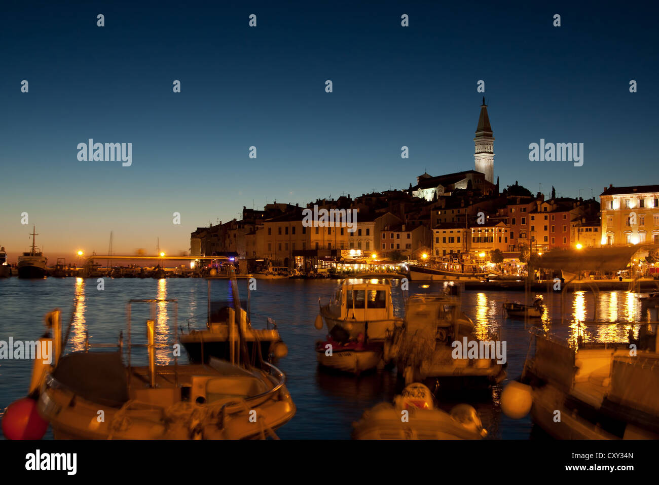 the night in old city Rovinj with boats - Croatia Stock Photo - Alamy