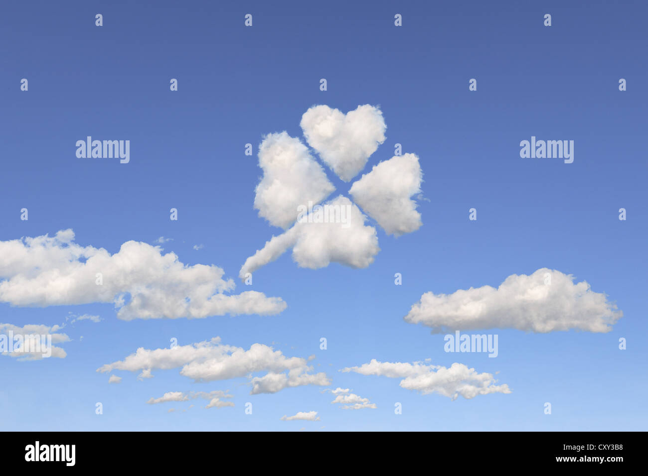 Cloud formations in the shape of a four-leafed clover, illustration ...