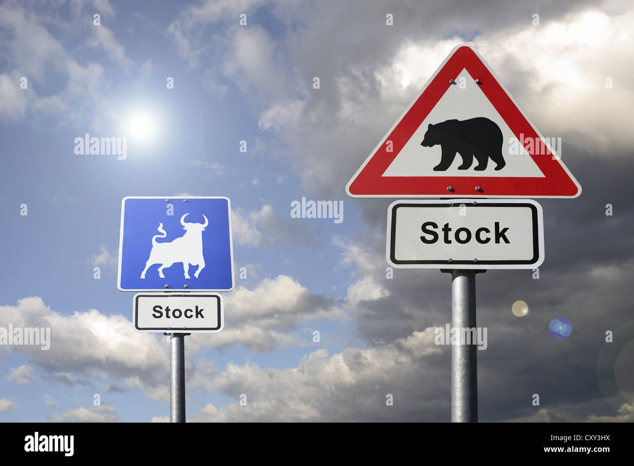 Street signs, pictograms of a bear and a bull, labelled Stock, in front ...