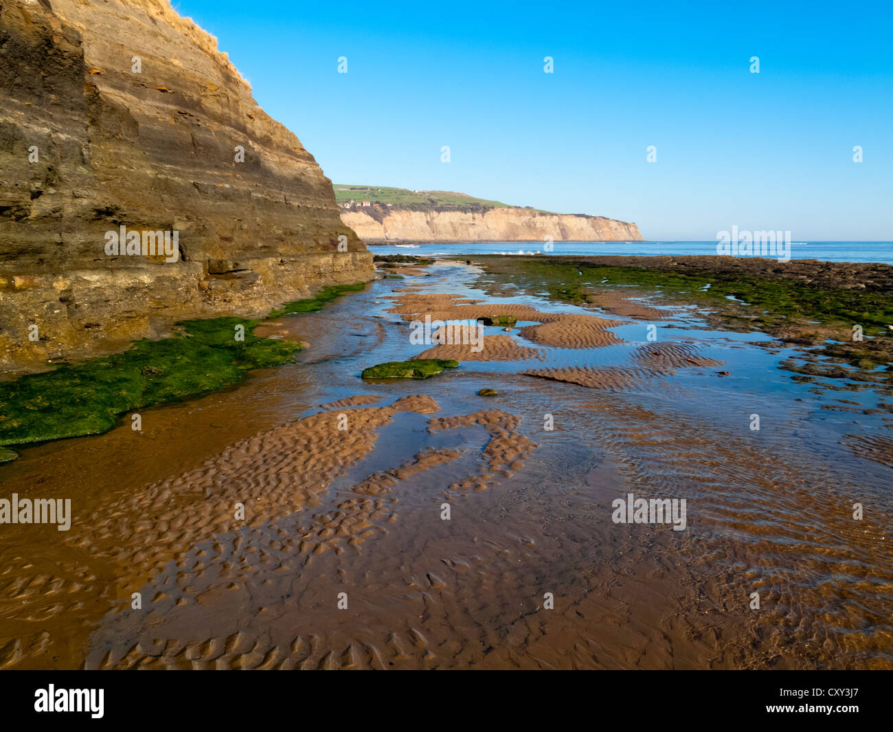 The beach at Boggle Hole in North Yorkshire England UK looking north ...