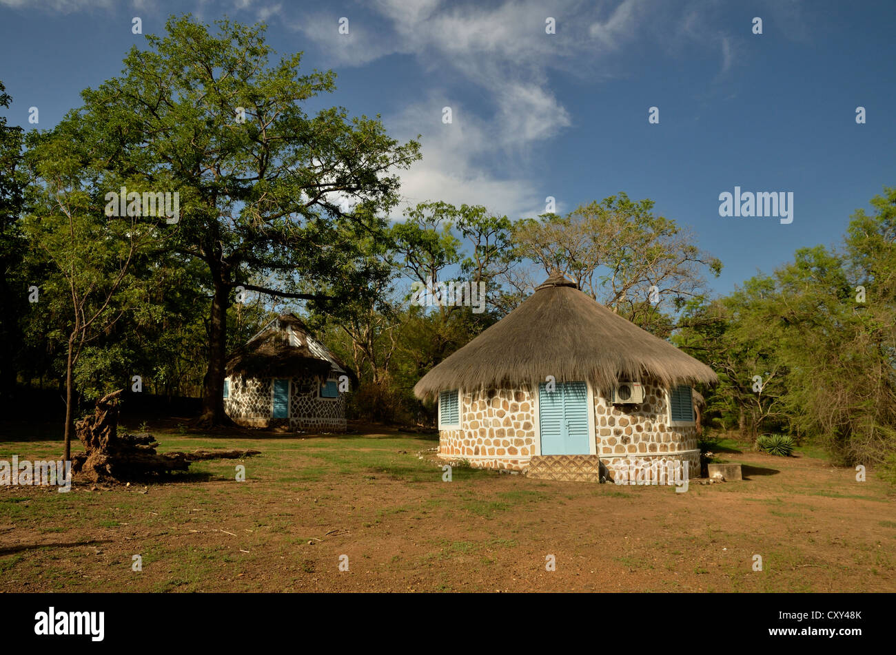 Round huts of the Benoué Lodge in the Parc National le a Bénoué ...