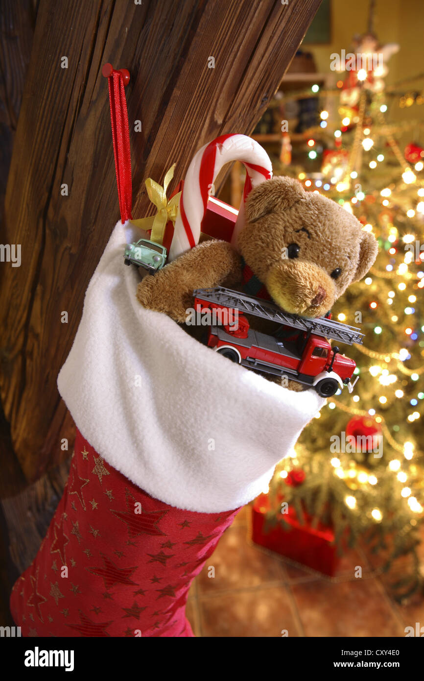 Santa Claus or Christmas stocking filled with Christmas gifts ...