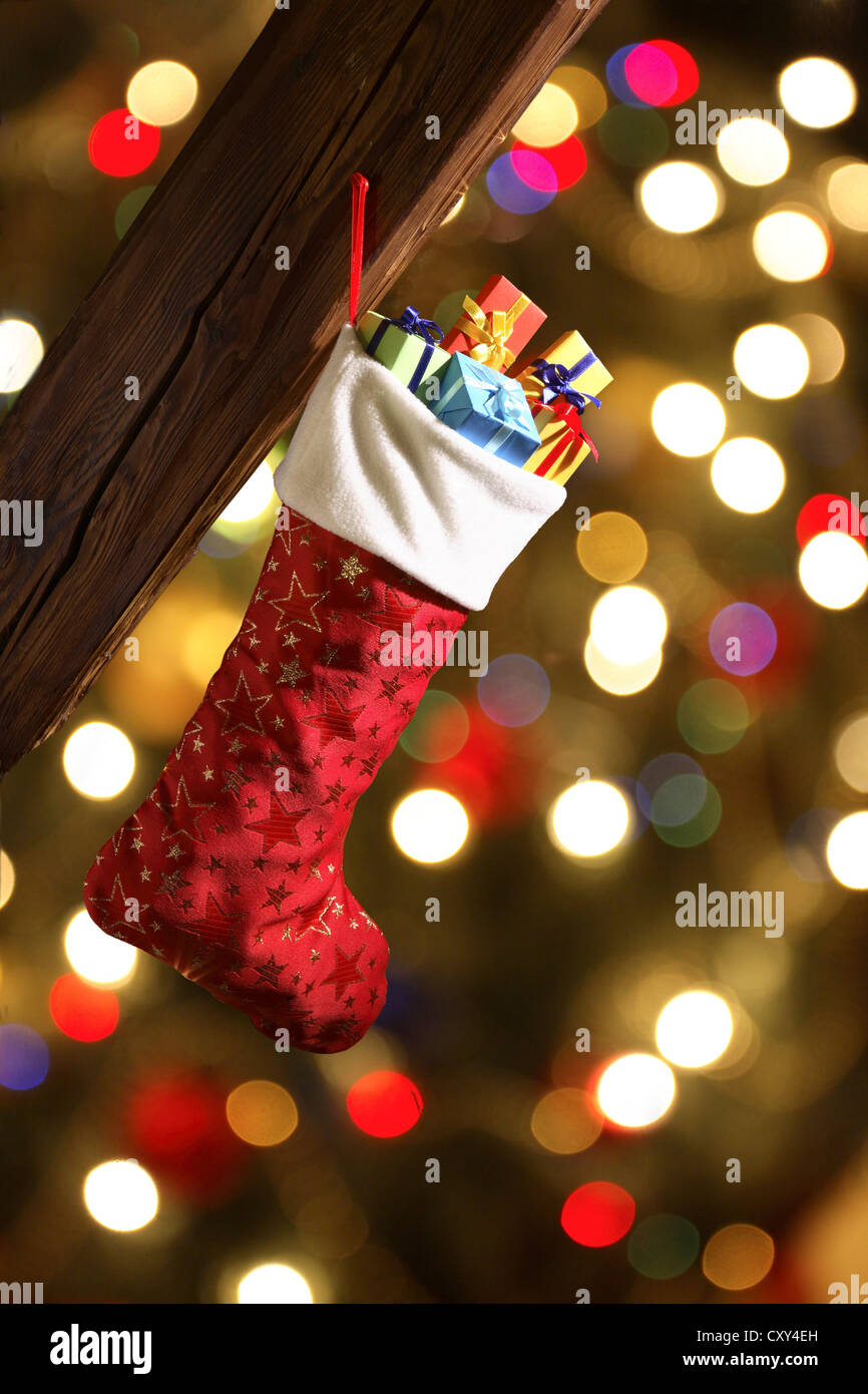 Christmas stocking filled presents hi-res stock photography and images ...