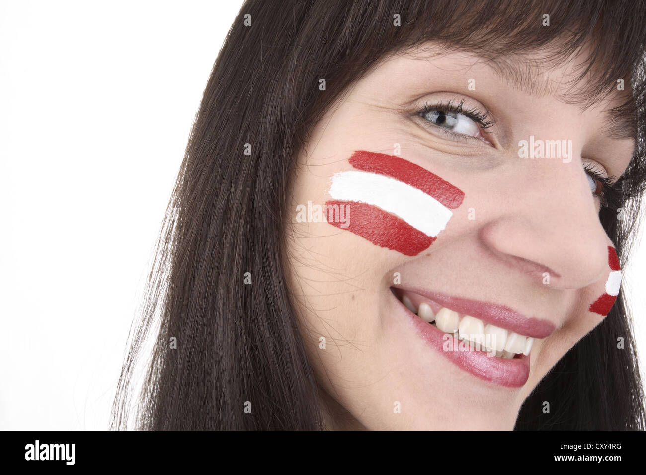 Young woman, football fan with a painted face, Austrian national flag ...
