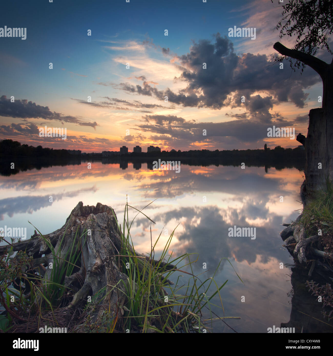 Sunset on the lake. Nature background Stock Photo - Alamy