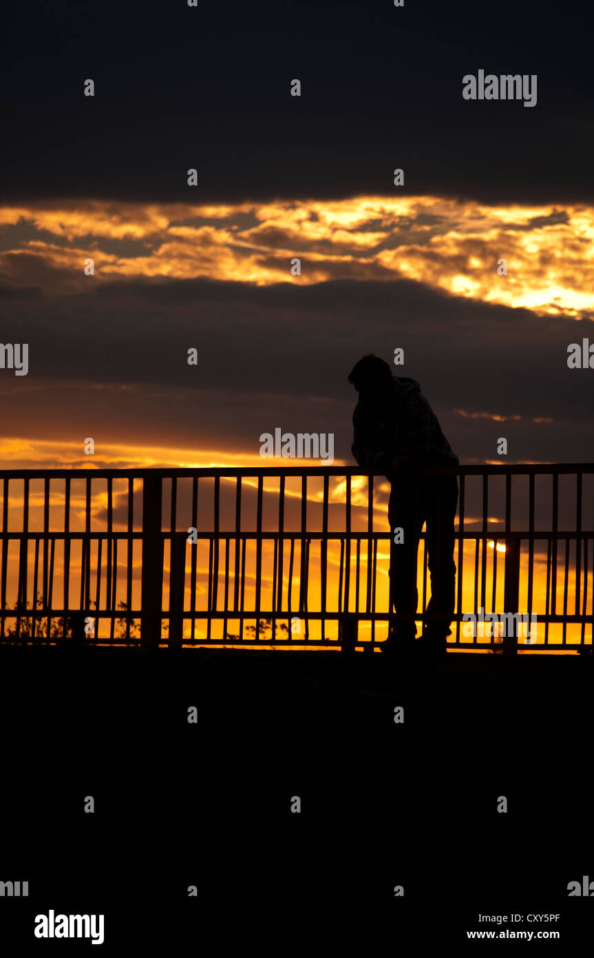 Man on a bridge Stock Photo - Alamy