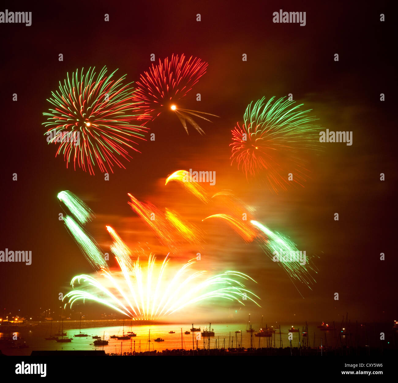 Firework Display over water Stock Photo - Alamy