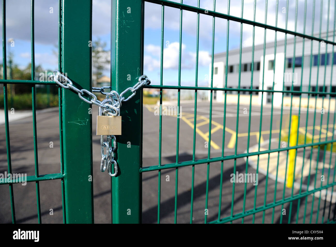 Locked gates baring entry to a new commercial office development Stock ...