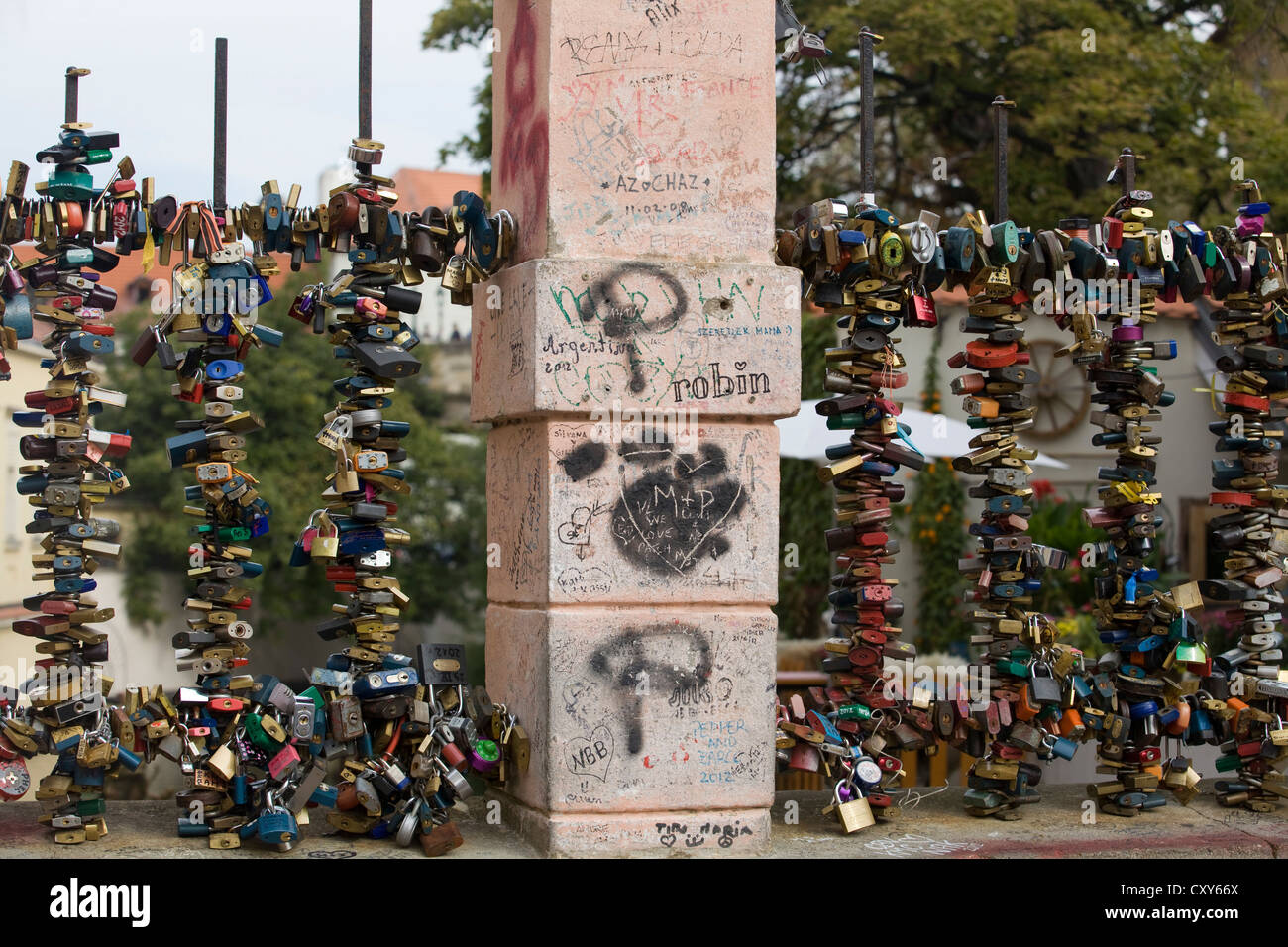 Love padlocks affixed to a fence gate or bridge by sweethearts to ...