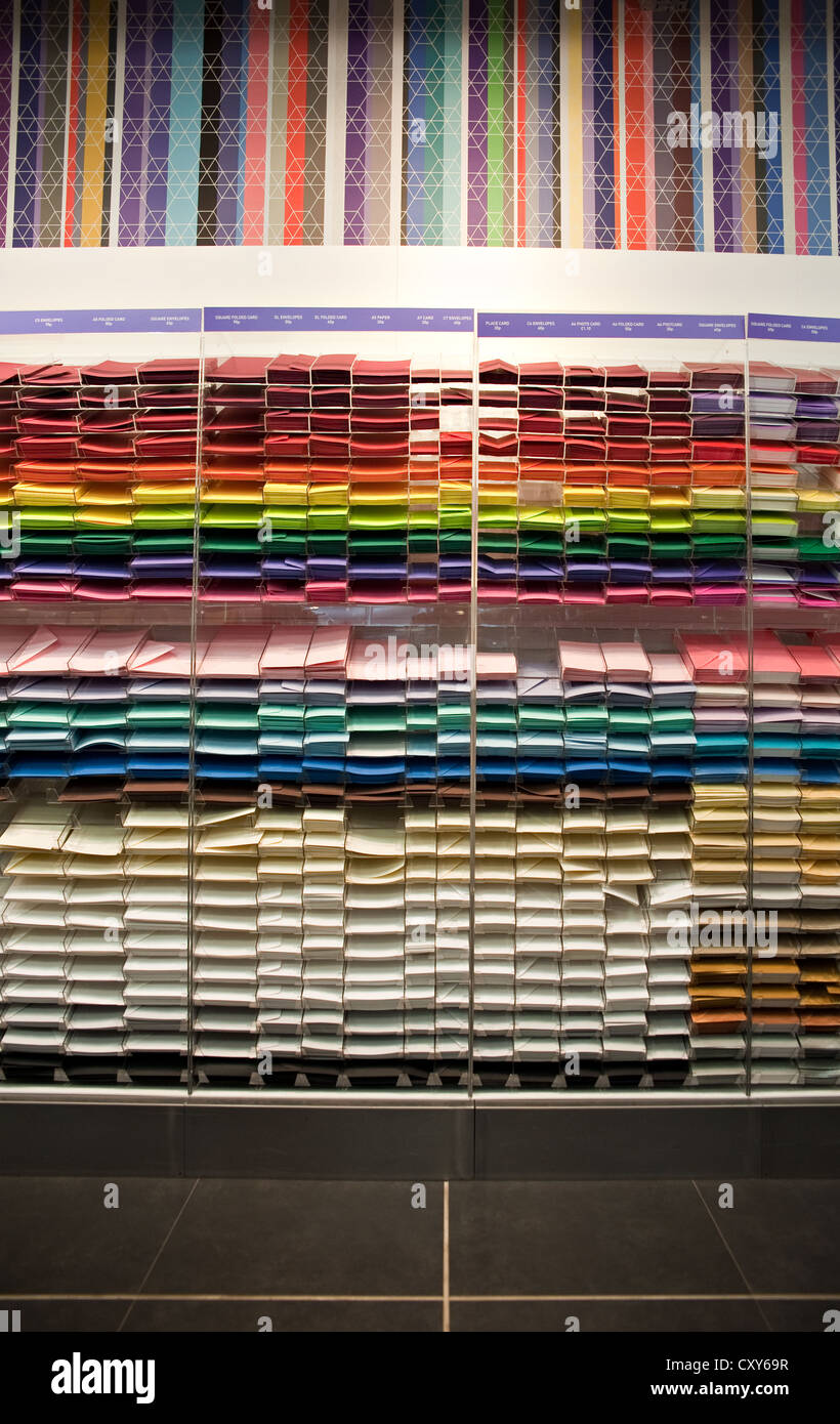 An array of different coloured art papers on shelf Stock Photo - Alamy