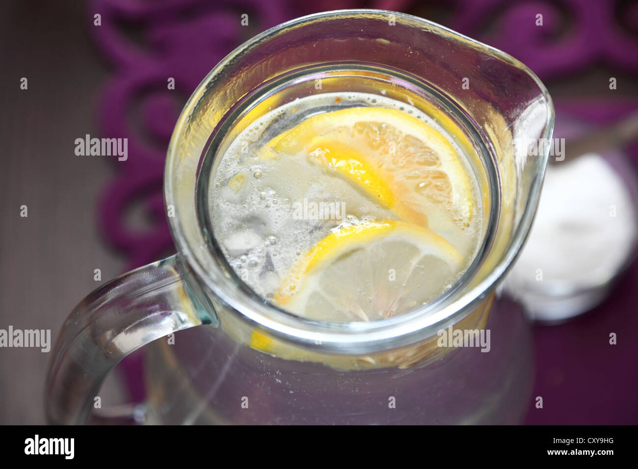 glass of water lemon cold fresh lemonade with ice Stock Photo - Alamy
