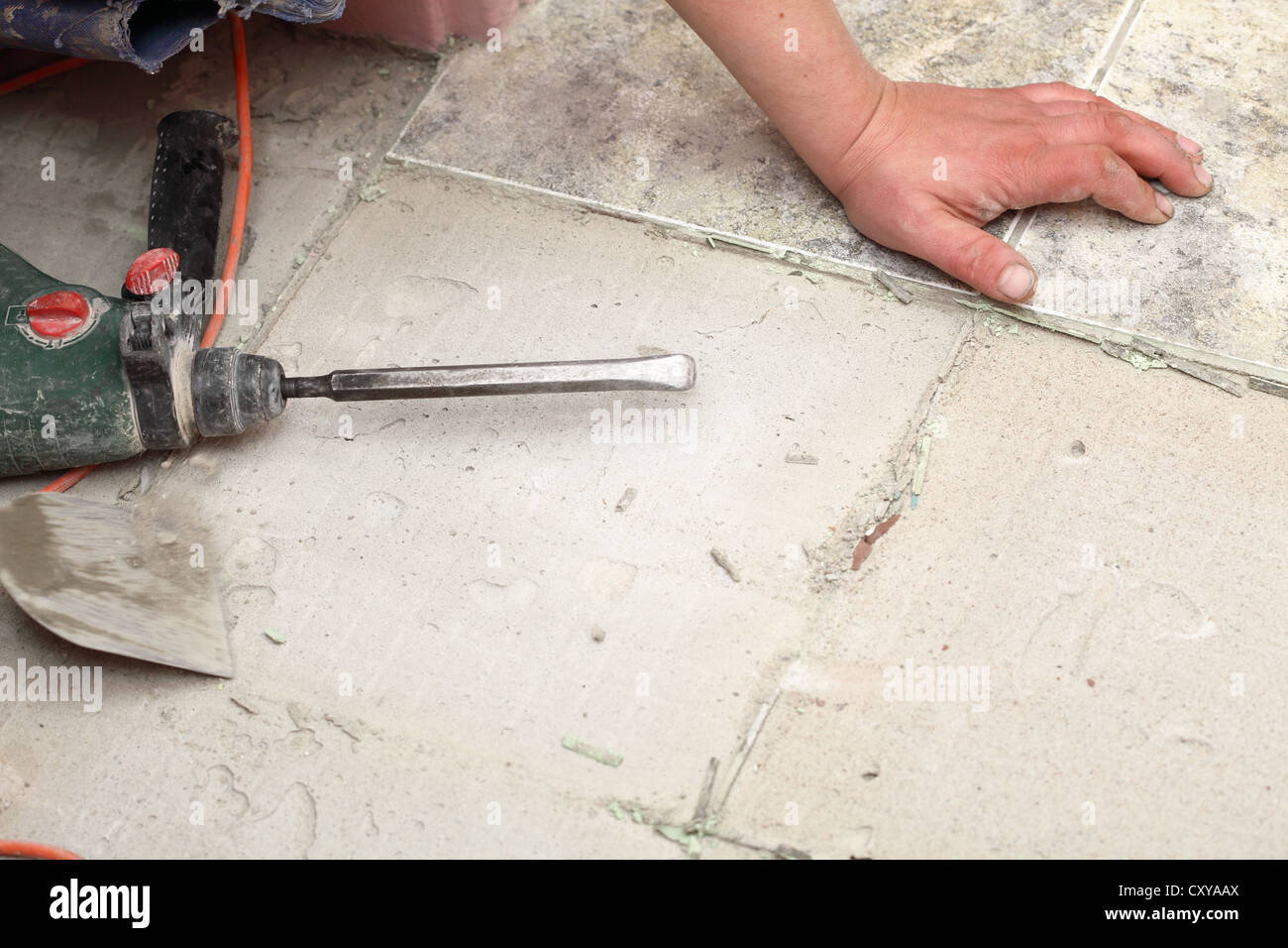 demolition hammer mason manual work floor tool worker Stock Photo - Alamy