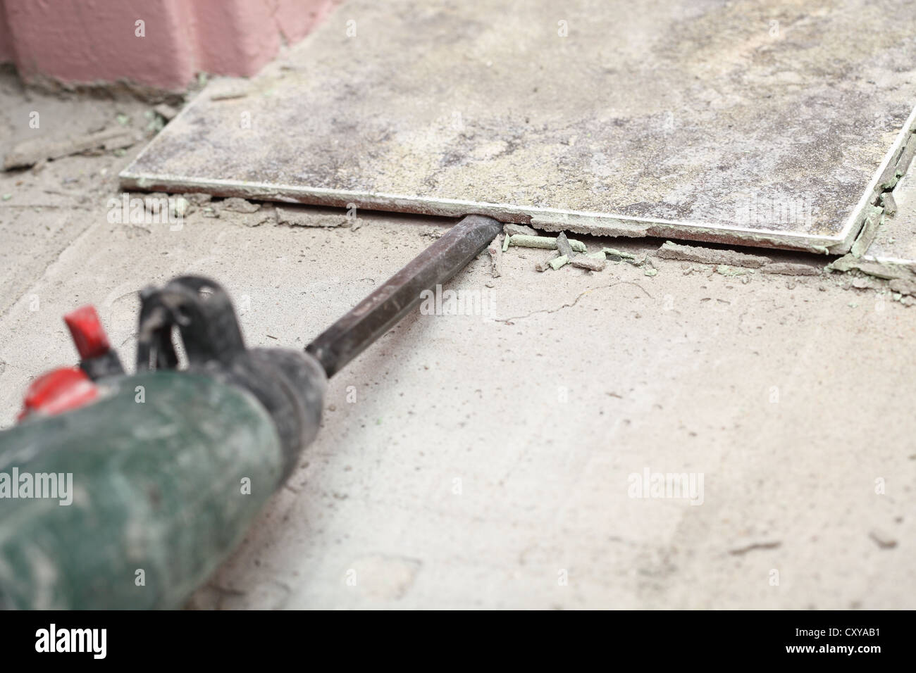 demolition hammer mason manual work floor tool worker Stock Photo - Alamy