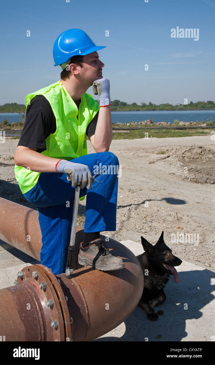 smile of young worker - portrait Stock Photo - Alamy