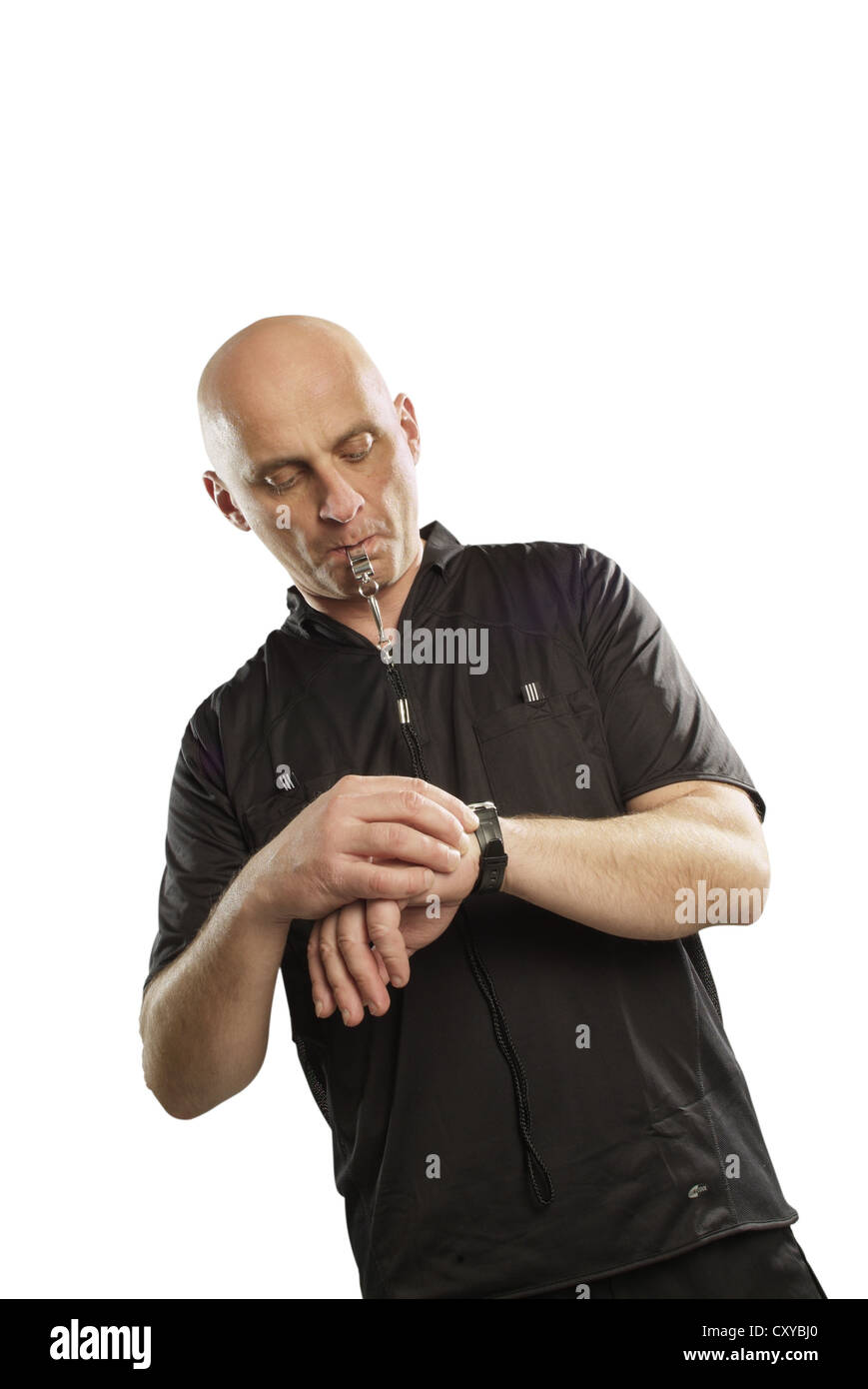 Referee looking at his watch Stock Photo - Alamy