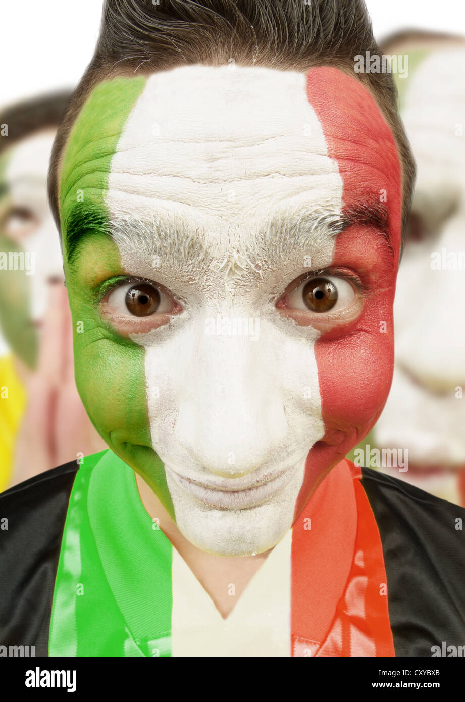 Football fan with his face painted in the national colours of Italy ...