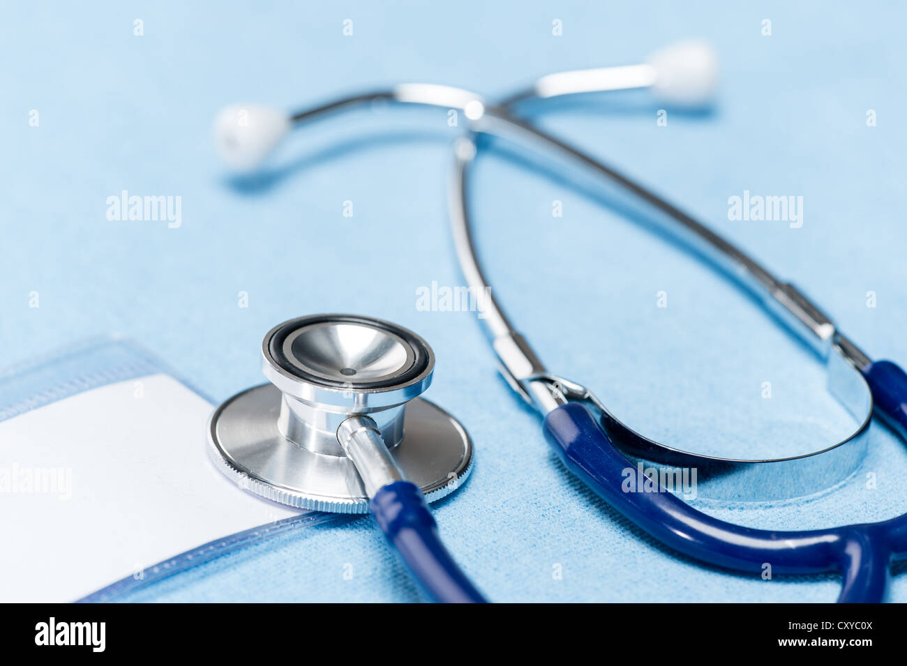Blue stethoscope over doctor coat medical equipment close-up Stock ...