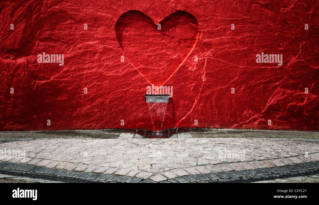 Red heart in a wall Stock Photo - Alamy