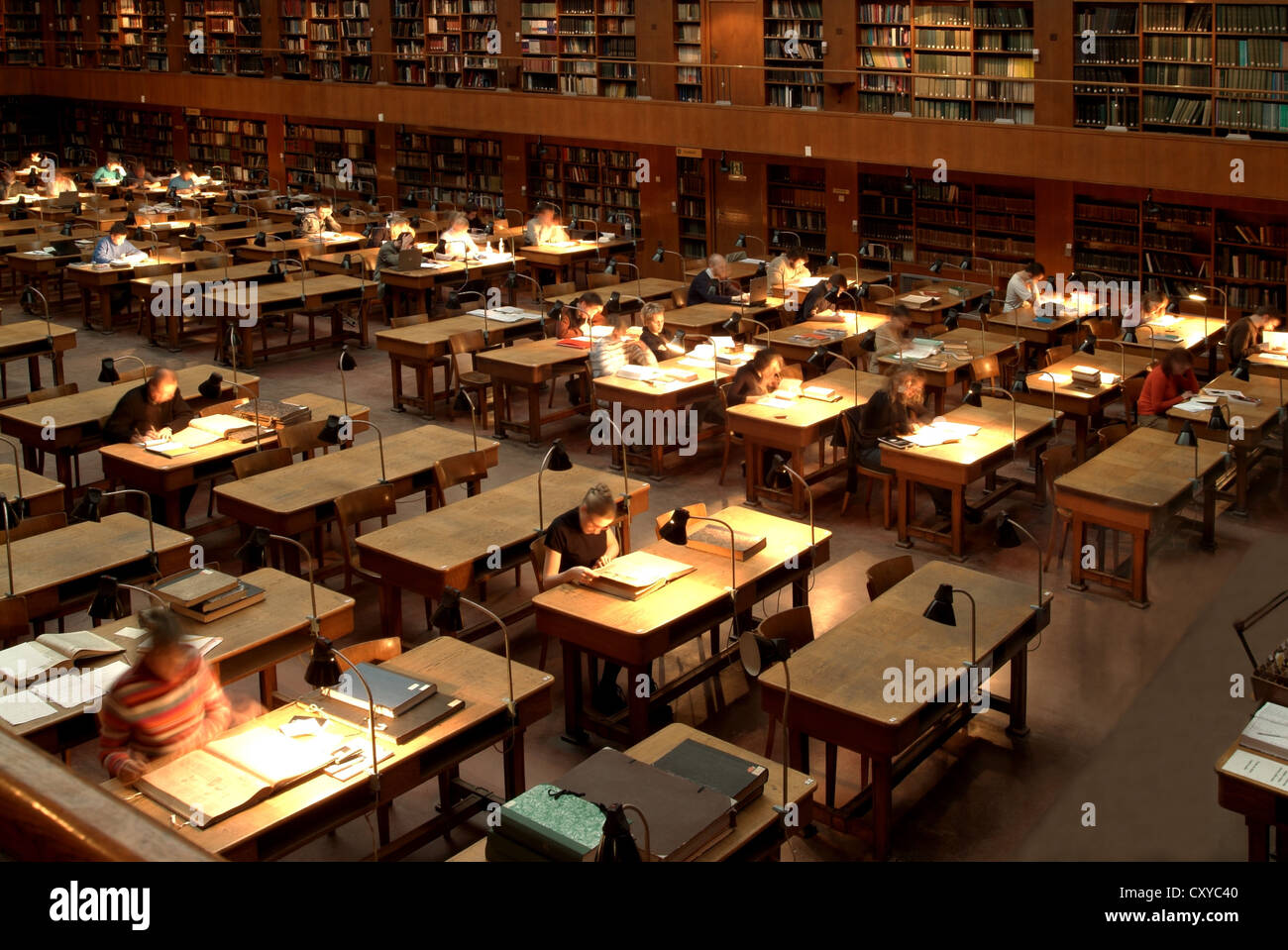 Students studying in the reading room of a university library Stock ...