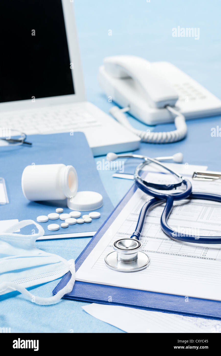 Doctor's office desk with medical supplies documents stethoscope Stock ...