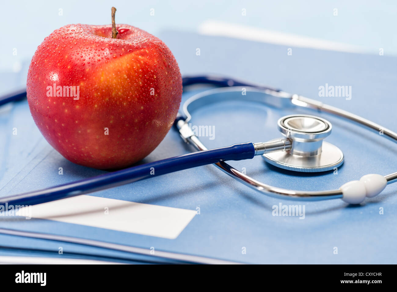 Healthcare red apple and medical stethoscope healthy lifestyle Stock ...