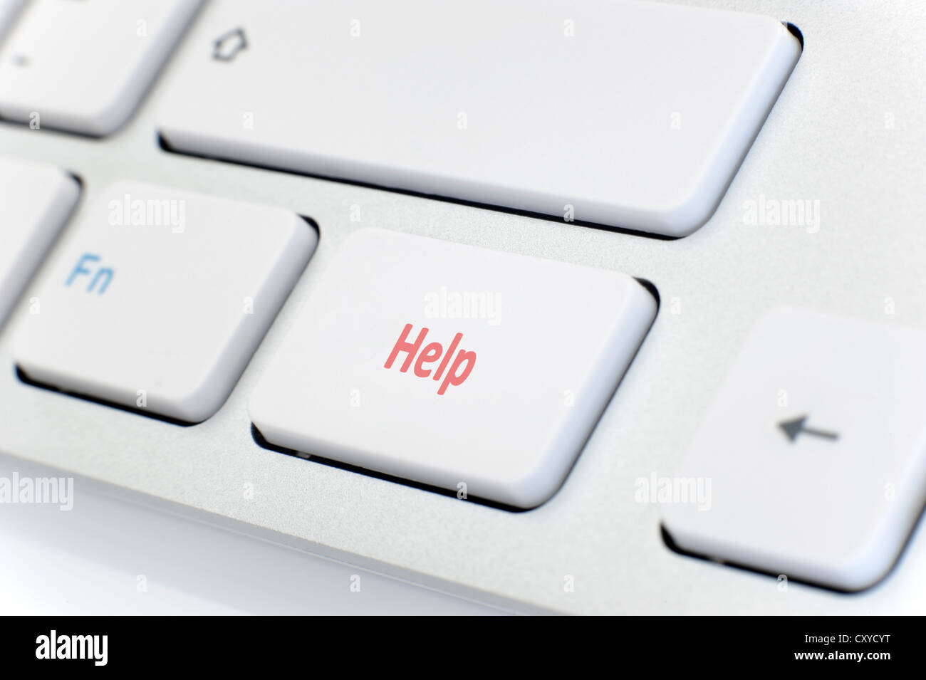 Modern white keyboard with the word "Help" in red Stock Photo - Alamy
