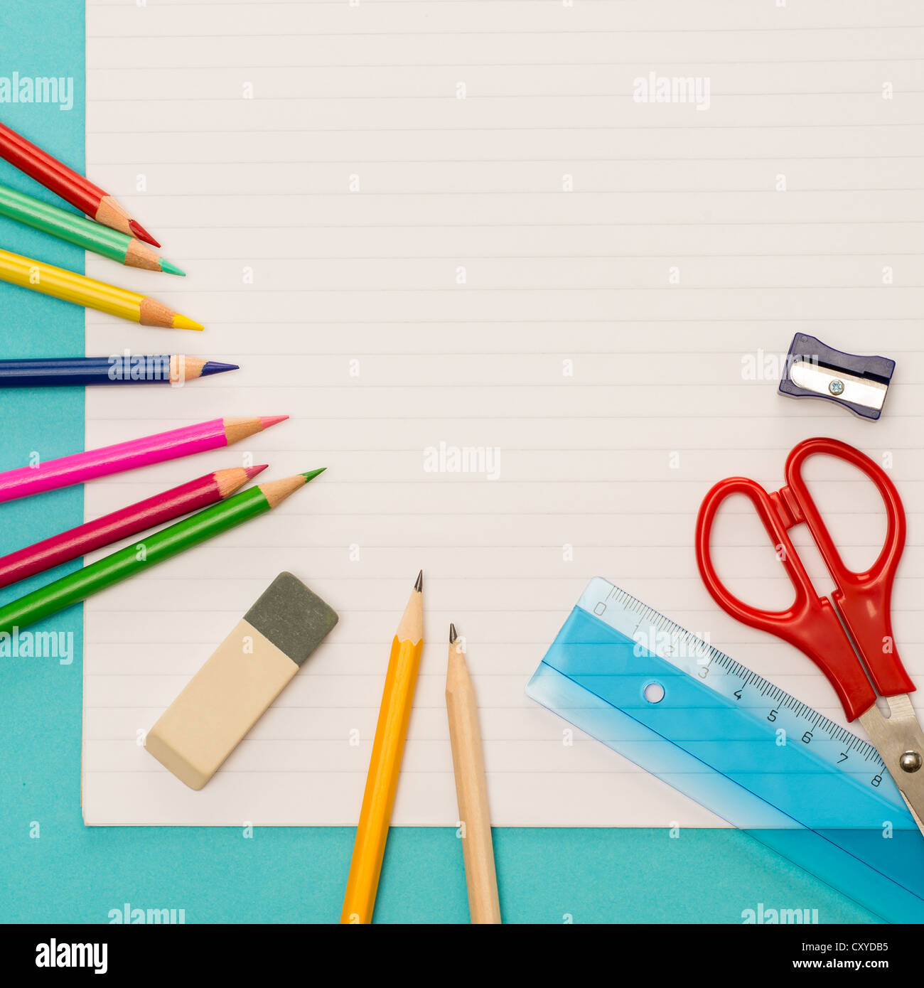 Back to school children accessories on striped notepad Stock Photo - Alamy