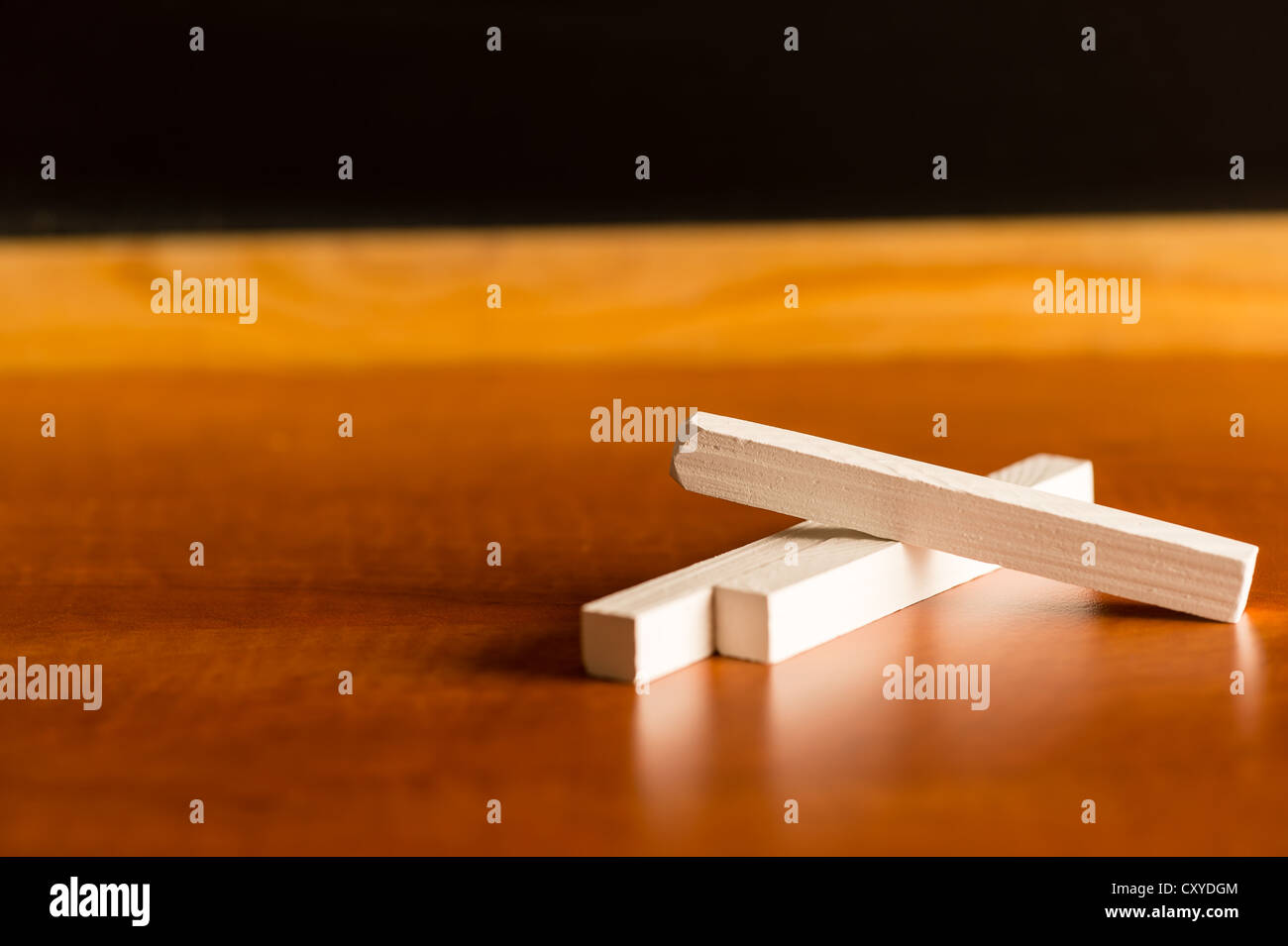 White chalks on academic wooden table traditional university decor ...