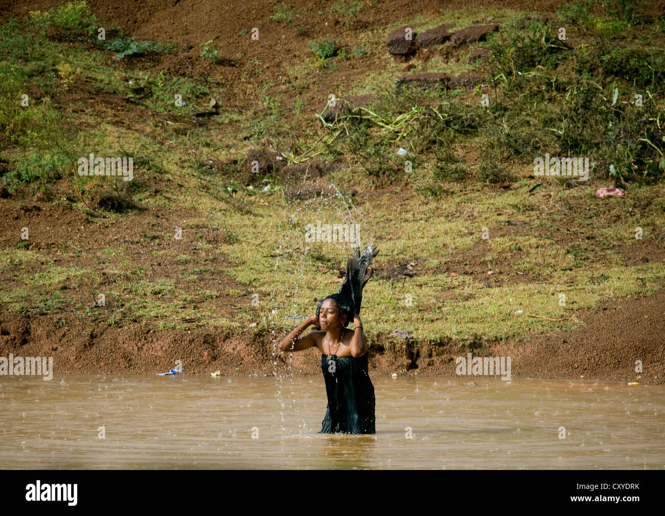 Woman Washing Her Hair In A Lake, Kanadukathan Chettinad, India Stock ...