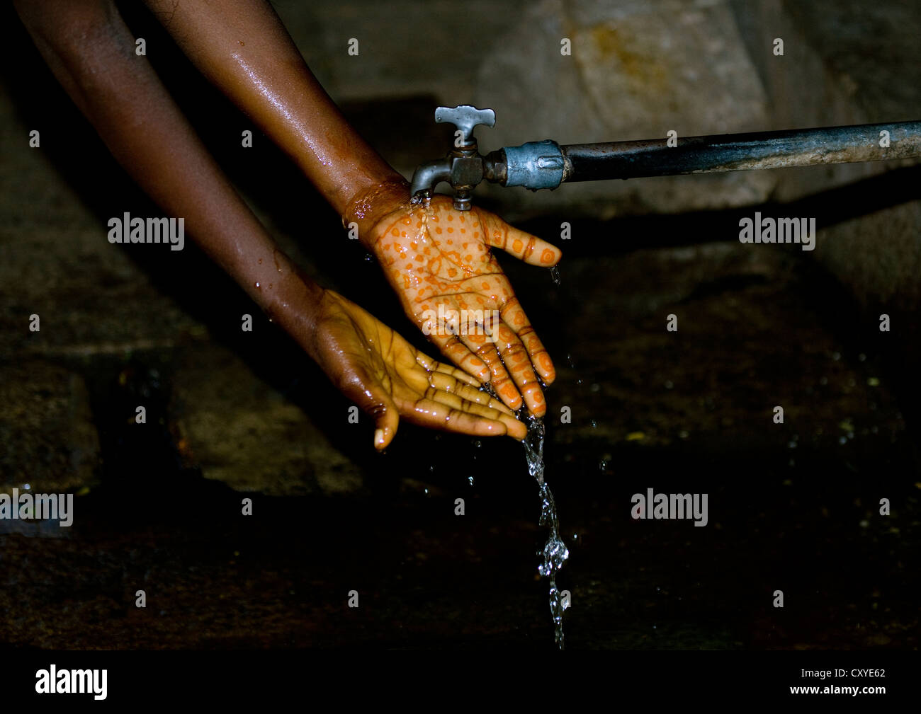 Washing Hands Tattoed With Henna In The Sri Ranganathaswamy Temple ...
