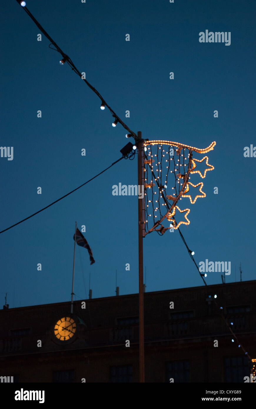 Christmas lights against a dark blue night sky in Cambridge with ...