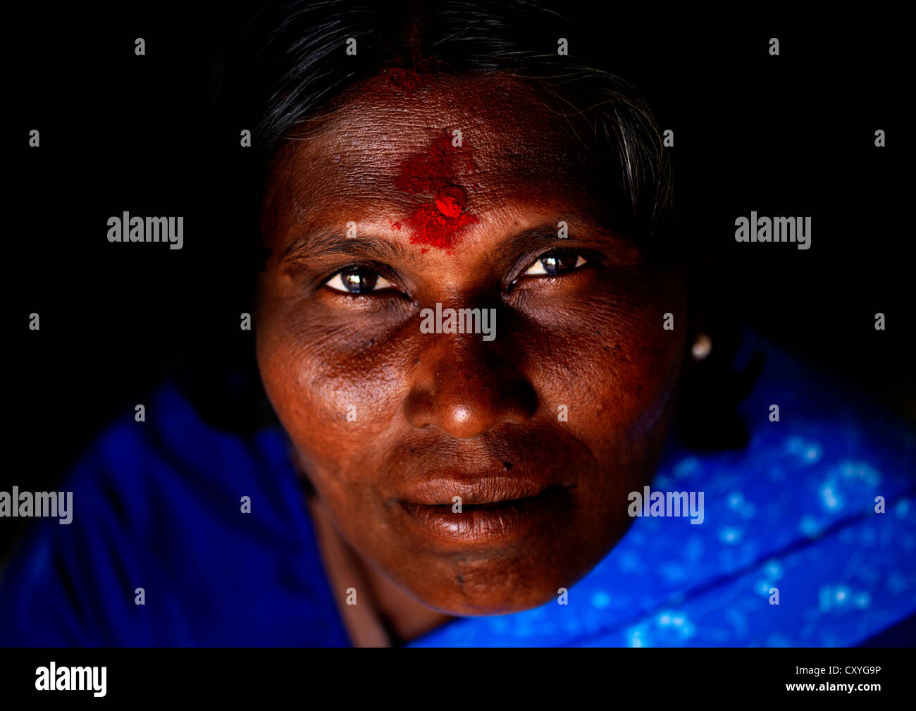 Mature Indian Woman With Red Spot On Her Forehead, Madurai, India Stock ...