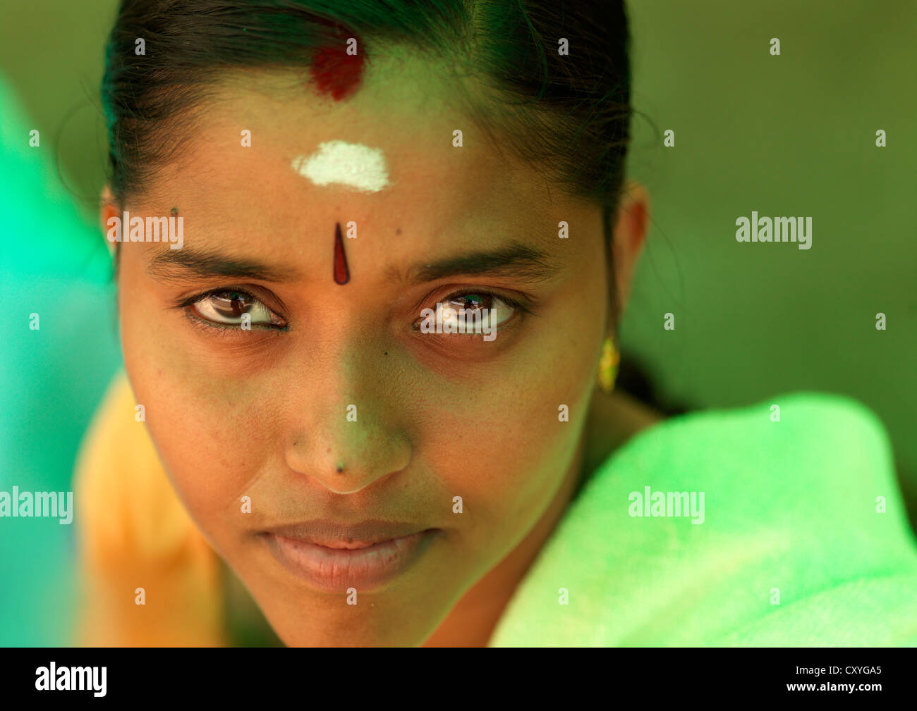 Portrait Of A Young Indian Woman With Traditional Painting On Her ...