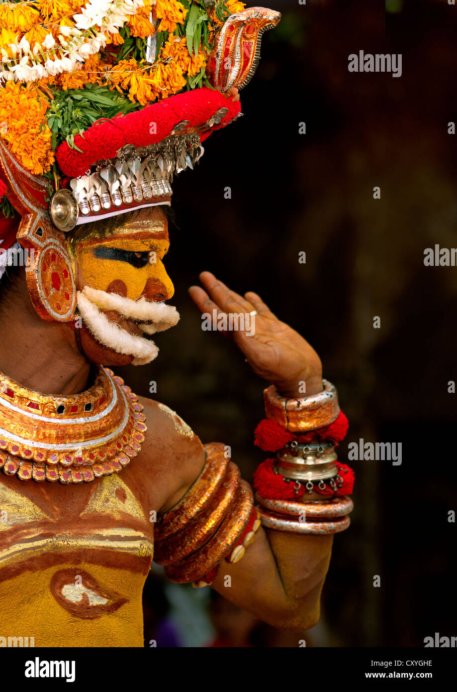 Man performing theyyam dance hi-res stock photography and images - Alamy