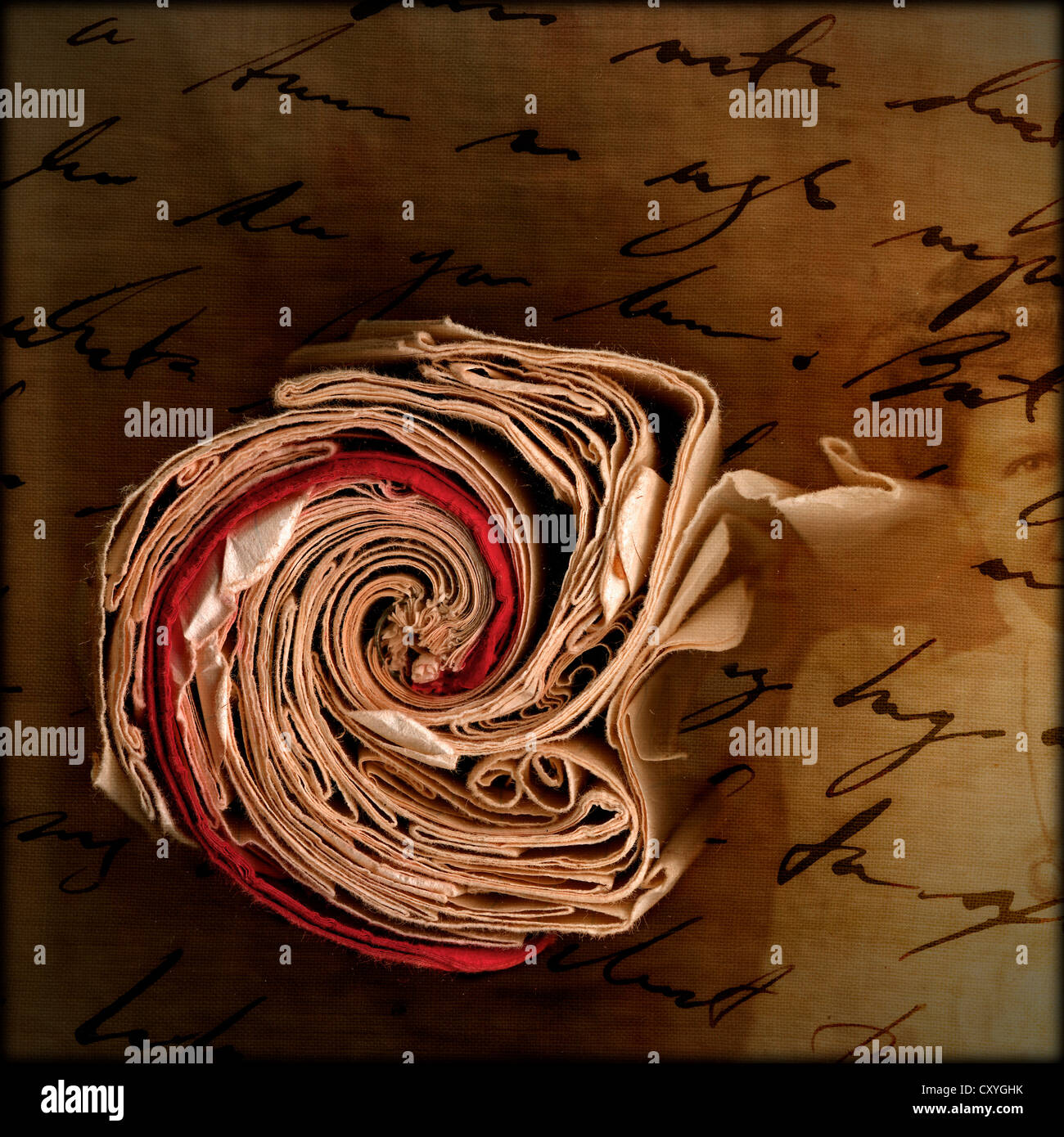 End view of a rolled notebook with hand written script Stock Photo - Alamy