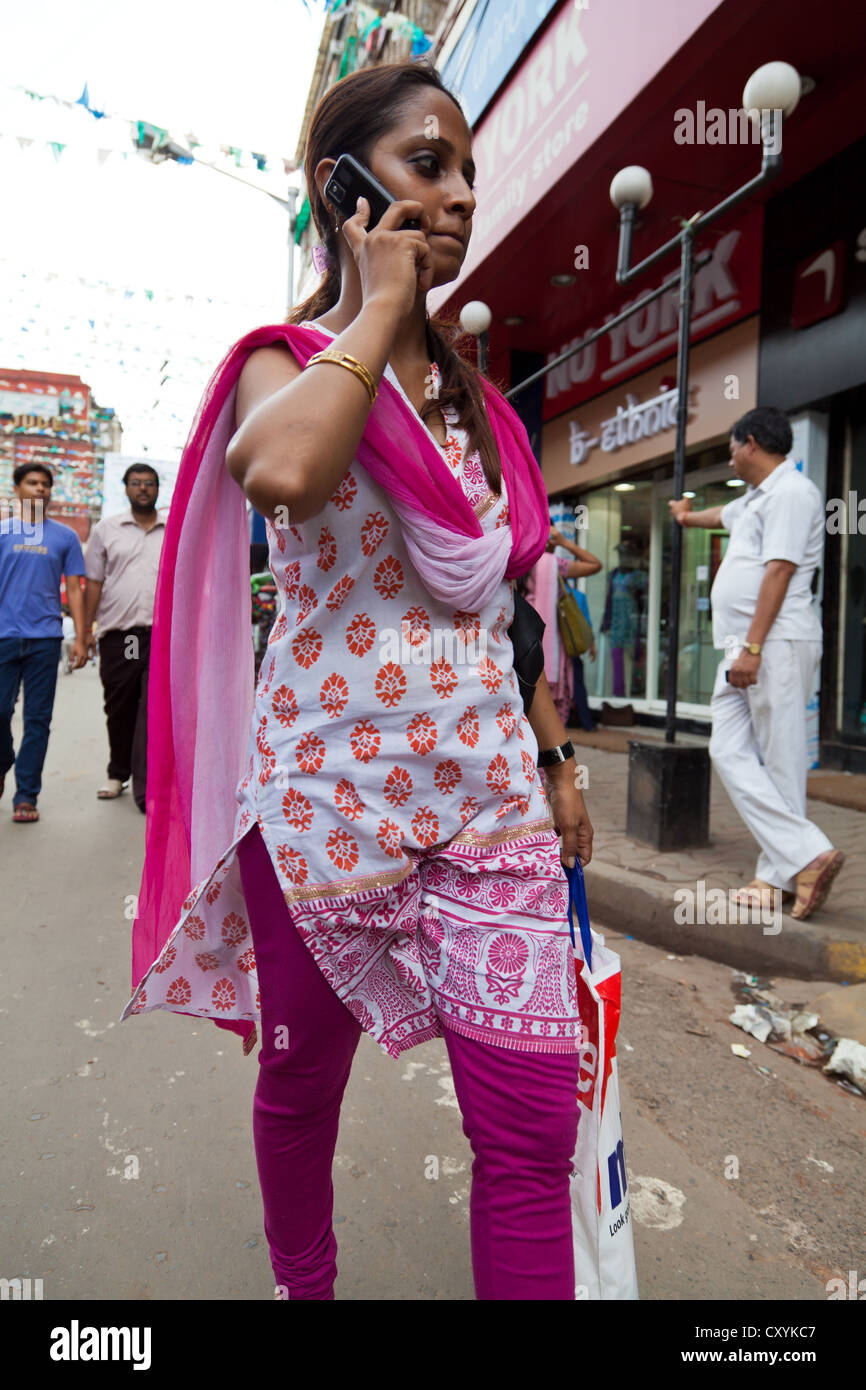 Indian talking mobile phone human face hi-res stock photography and ...