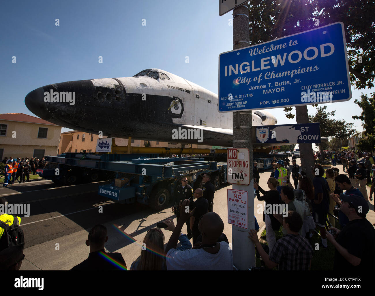 NASA space shuttle Endeavour is maneuvered streets of Inglewood while ...